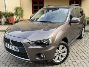 Brown Mitsubishi Outlander 2012 in Riga, with an engine capacity of 2.30 L and mileage of 206 thousand km for 7250 €, photo  on AUTOMOTO.COM.LV
