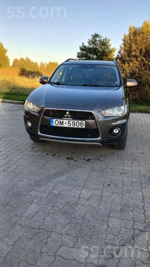 Brūns Mitsubishi Outlander 2012 Liepāja, ar dzinēja tilpumu 2.30 L un nobraukumu 245 tūkst. km par 7600 €, foto  vietnē AUTOMOTO.COM.LV