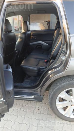 Brown Mitsubishi Outlander 2012 in Liepaja, with an engine capacity of 2.30 L and mileage of 245 thousand km for 7600 €, photo 9 on AUTOMOTO.COM.LV