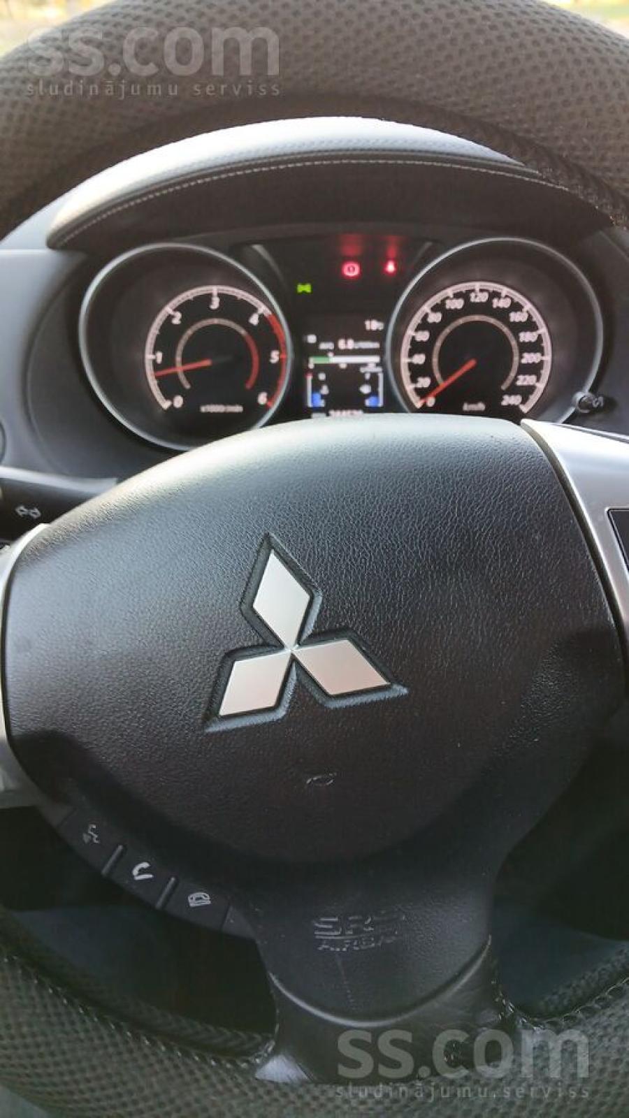 Brown Mitsubishi Outlander 2012 in Liepaja, with an engine capacity of 2.30 L and mileage of 245 thousand km for 7600 €, photo 11 on AUTOMOTO.COM.LV