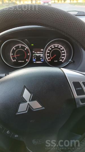 Brown Mitsubishi Outlander 2012 in Liepaja, with an engine capacity of 2.30 L and mileage of 245 thousand km for 7600 €, photo 14 on AUTOMOTO.COM.LV