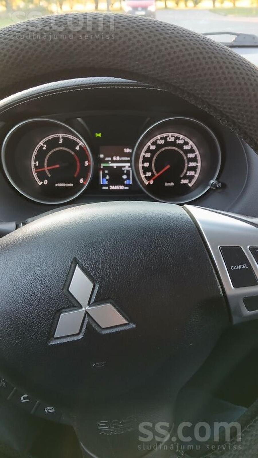Brown Mitsubishi Outlander 2012 in Liepaja, with an engine capacity of 2.30 L and mileage of 245 thousand km for 7600 €, photo 14 on AUTOMOTO.COM.LV