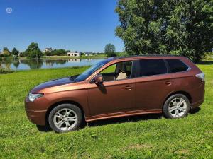 Brown Mitsubishi Outlander 2013 in Kaunas, with an engine capacity of 2.27 L and mileage of 263 thousand km for 6800 €, photo 5 on AUTOMOTO.COM.LV
