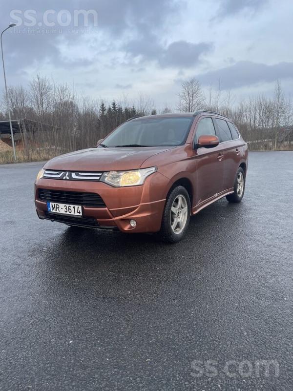 Brown Mitsubishi Outlander 2014 in Rezekne, with an engine capacity of 2.20 L and mileage of 318 thousand km for 5450 €, photo 1 on AUTOMOTO.COM.LV