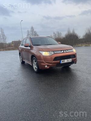 Brown Mitsubishi Outlander 2014 in Rezekne, with an engine capacity of 2.20 L and mileage of 318 thousand km for 5450 €, photo 7 on AUTOMOTO.COM.LV