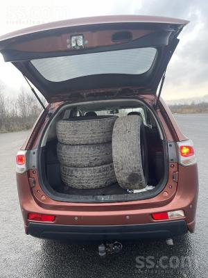 Brown Mitsubishi Outlander 2014 in Rezekne, with an engine capacity of 2.20 L and mileage of 318 thousand km for 5450 €, photo 9 on AUTOMOTO.COM.LV