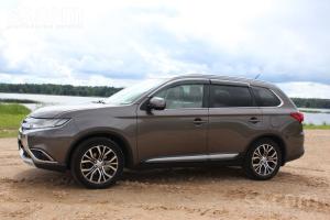 Brūns Mitsubishi Outlander 2015 Rīga, ar dzinēja tilpumu 2.00 L un nobraukumu 0 tūkst. km par 10150 €, foto  vietnē AUTOMOTO.COM.LV