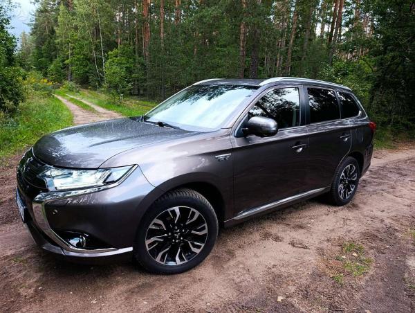 Brūns Mitsubishi Outlander 2015 Viļņa, ar dzinēja tilpumu 2.00 L un nobraukumu 212 tūkst. km par 13500 €, foto 10 vietnē AUTOMOTO.COM.LV