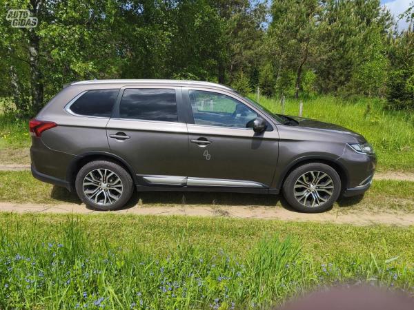 Brown Mitsubishi Outlander 2016 in Utena, with an engine capacity of 2.00 L and mileage of 222 thousand km for 11200 €, photo 1 on AUTOMOTO.COM.LV