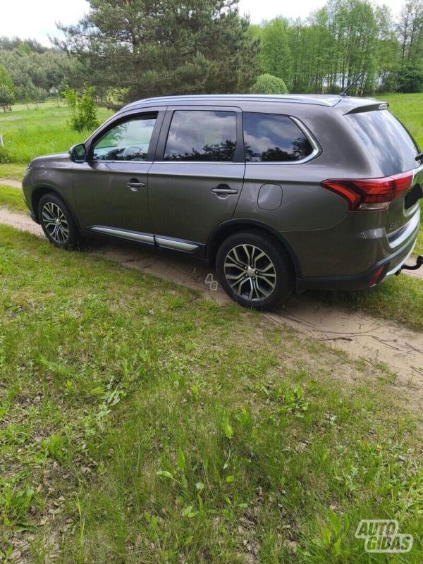 Brown Mitsubishi Outlander 2016 in Utena, with an engine capacity of 2.00 L and mileage of 222 thousand km for 11200 €, photo 3 on AUTOMOTO.COM.LV