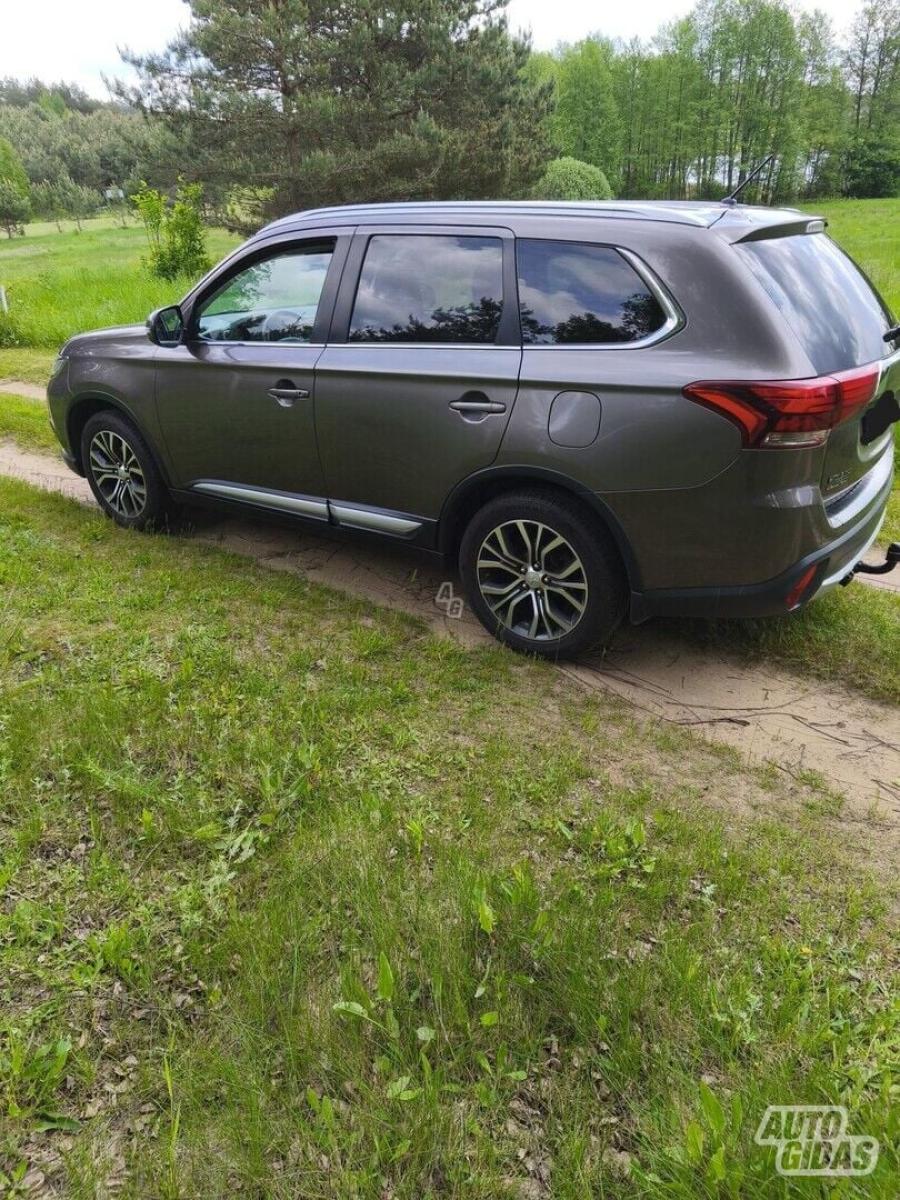 Brown Mitsubishi Outlander 2016 in Utena, with an engine capacity of 2.00 L and mileage of 222 thousand km for 11200 €, photo 4 on AUTOMOTO.COM.LV