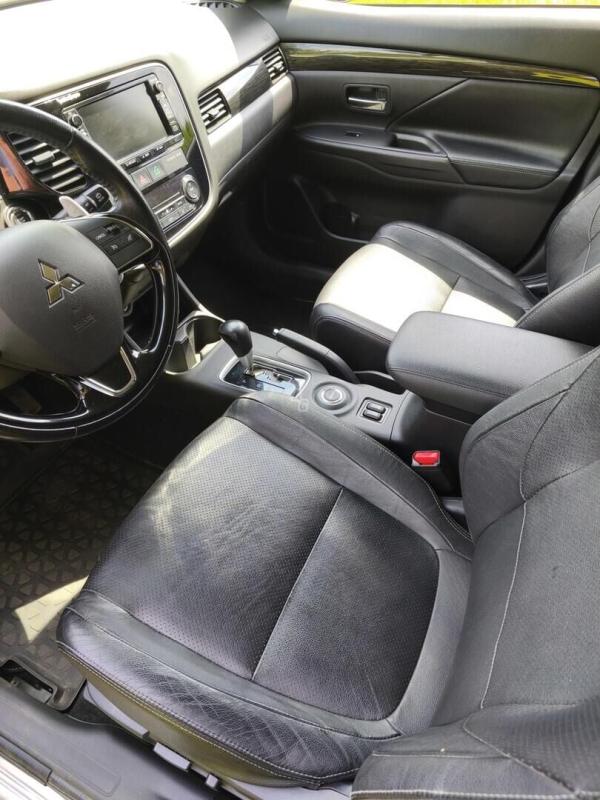 Brown Mitsubishi Outlander 2016 in Utena, with an engine capacity of 2.00 L and mileage of 222 thousand km for 11200 €, photo 7 on AUTOMOTO.COM.LV