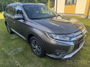 Brūns Mitsubishi Outlander 2016 Rīga, ar dzinēja tilpumu 2.00 L un nobraukumu 173 tūkst. km par 13990 €, foto 3 vietnē AUTOMOTO.COM.LV