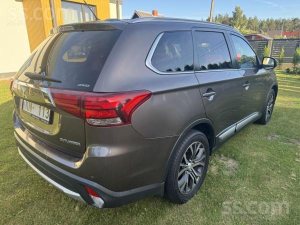 Brūns Mitsubishi Outlander 2016 Rīga, ar dzinēja tilpumu 2.00 L un nobraukumu 173 tūkst. km par 13990 €, foto 4 vietnē AUTOMOTO.COM.LV