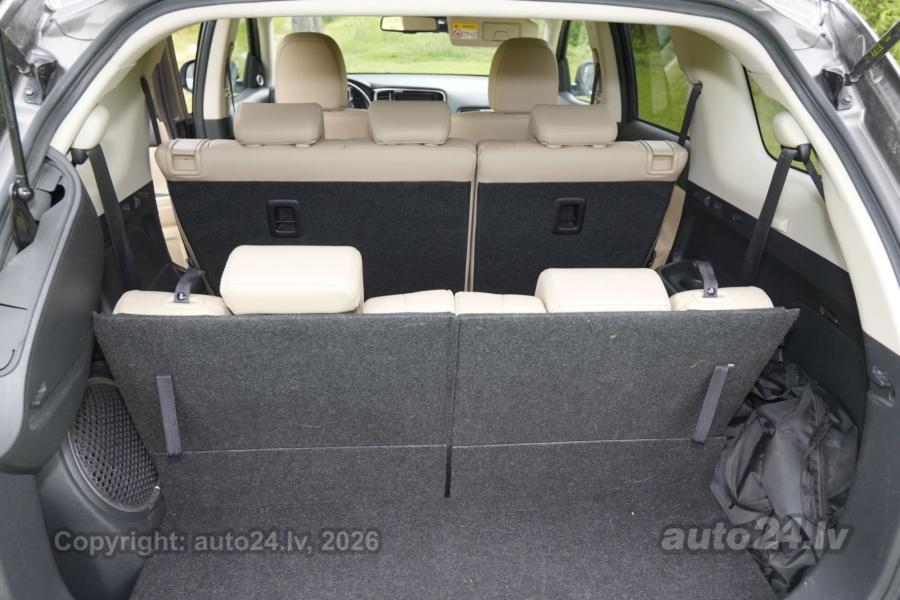 Brūns Mitsubishi Outlander 2019 Tallina, ar dzinēja tilpumu 2.00 L un nobraukumu 153 tūkst. km par 18000 €, foto 6 vietnē AUTOMOTO.COM.LV