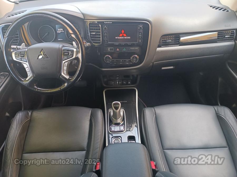 Brūns Mitsubishi Outlander 2017 Tallina, ar dzinēja tilpumu 2.00 L un nobraukumu 197 tūkst. km par 14990 €, foto 6 vietnē AUTOMOTO.COM.LV
