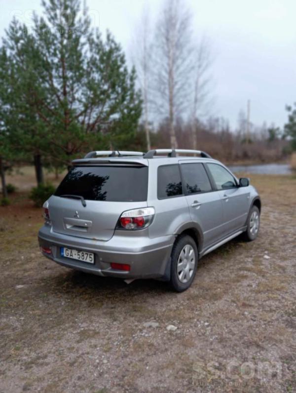 Mitsubishi Outlander 2006 Liepāja, ar dzinēja tilpumu 2.40 L un nobraukumu 213 tūkst. km par 900 €, foto 4 vietnē AUTOMOTO.COM.LV