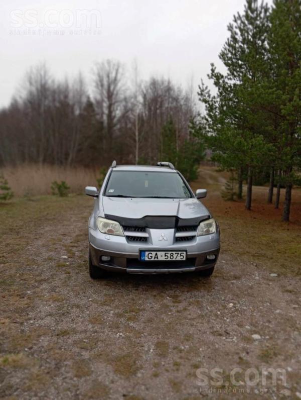 Mitsubishi Outlander 2006 Liepāja, ar dzinēja tilpumu 2.40 L un nobraukumu 213 tūkst. km par 900 €, foto 5 vietnē AUTOMOTO.COM.LV