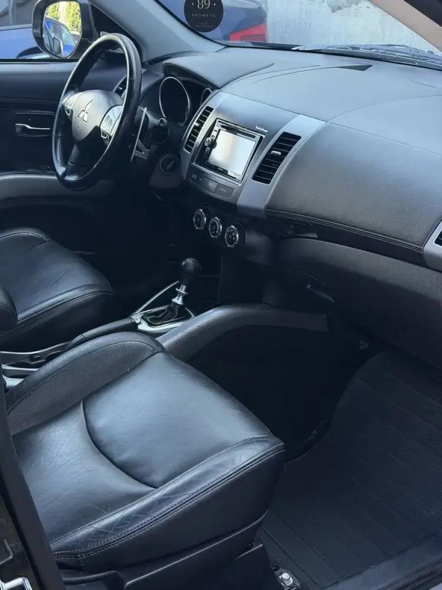 Mitsubishi Outlander 2011 Rīga, ar dzinēja tilpumu 2.20 L un nobraukumu 309 tūkst. km par 3680 €, foto 11 vietnē AUTOMOTO.COM.LV