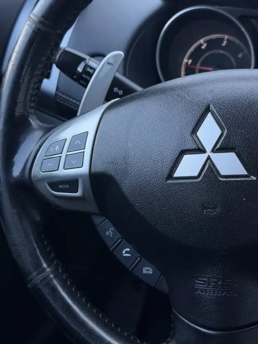 Mitsubishi Outlander 2011 Rīga, ar dzinēja tilpumu 2.20 L un nobraukumu 309 tūkst. km par 3680 €, foto 18 vietnē AUTOMOTO.COM.LV