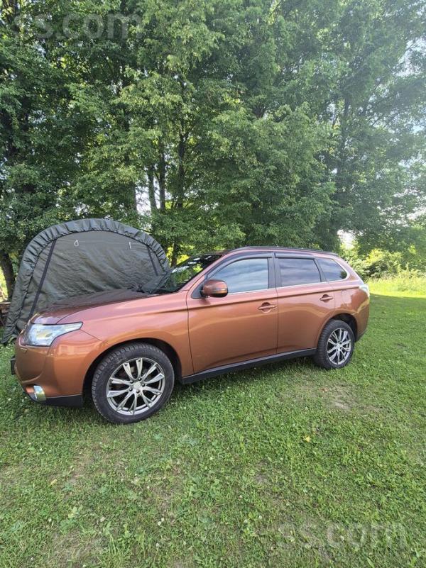 Mitsubishi Outlander 2013 Rēzekne, ar dzinēja tilpumu 2.20 L un nobraukumu 301 tūkst. km par 7000 €, foto 5 vietnē AUTOMOTO.COM.LV
