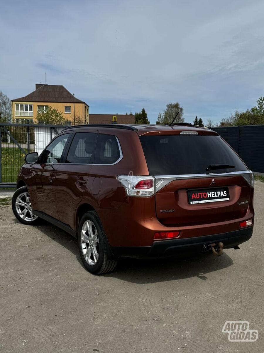 Mitsubishi Outlander 2014 in Klaipeda, with an engine capacity of 2.30 L and mileage of 225 thousand km for 7399 €, photo 6 on AUTOMOTO.COM.LV