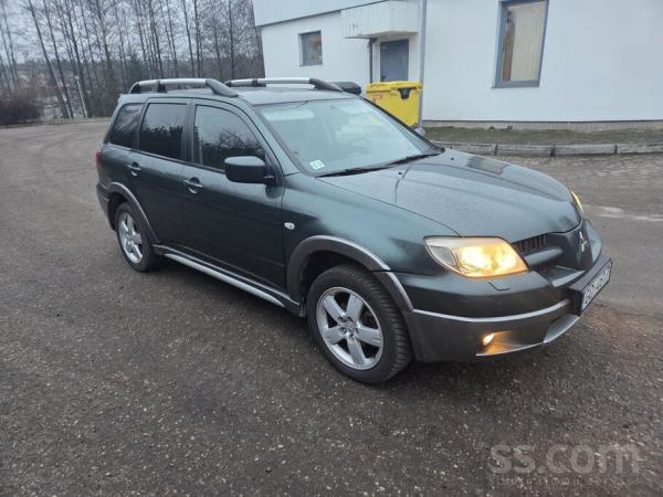 Zaļš Mitsubishi Outlander 2007 Daugavpils, ar dzinēja tilpumu 2.40 L un nobraukumu 0 tūkst. km par 2499 €, foto 1 vietnē AUTOMOTO.COM.LV