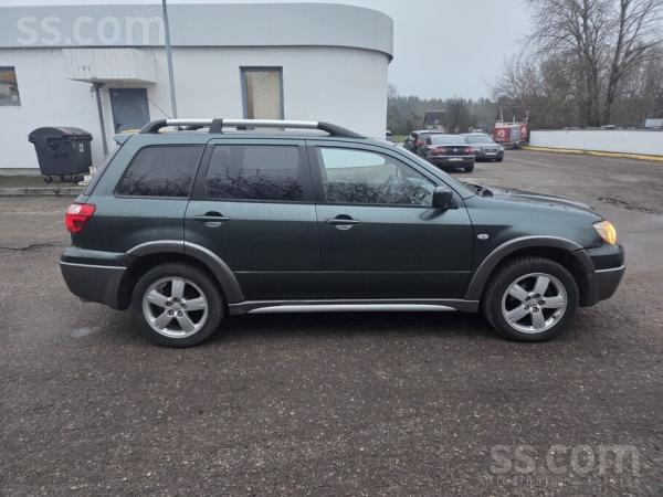 Zaļš Mitsubishi Outlander 2007 Daugavpils, ar dzinēja tilpumu 2.40 L un nobraukumu 0 tūkst. km par 2499 €, foto 2 vietnē AUTOMOTO.COM.LV
