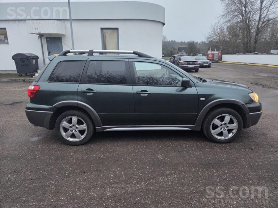 Zaļš Mitsubishi Outlander 2007 Daugavpils, ar dzinēja tilpumu 2.40 L un nobraukumu 0 tūkst. km par 2499 €, foto 2 vietnē AUTOMOTO.COM.LV