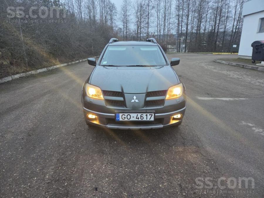 Zaļš Mitsubishi Outlander 2007 Daugavpils, ar dzinēja tilpumu 2.40 L un nobraukumu 0 tūkst. km par 2499 €, foto 3 vietnē AUTOMOTO.COM.LV