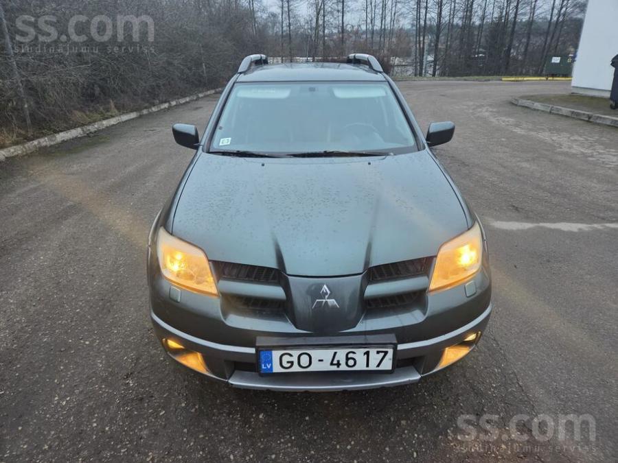 Zaļš Mitsubishi Outlander 2007 Daugavpils, ar dzinēja tilpumu 2.40 L un nobraukumu 0 tūkst. km par 2499 €, foto 4 vietnē AUTOMOTO.COM.LV