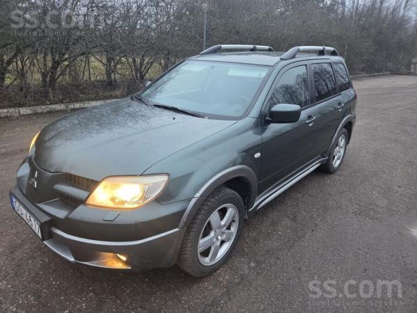 Zaļš Mitsubishi Outlander 2007 Daugavpils, ar dzinēja tilpumu 2.40 L un nobraukumu 0 tūkst. km par 2499 €, foto 5 vietnē AUTOMOTO.COM.LV