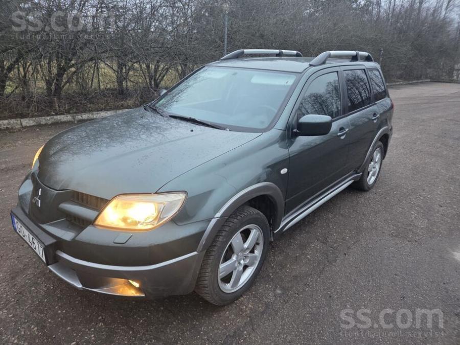 Zaļš Mitsubishi Outlander 2007 Daugavpils, ar dzinēja tilpumu 2.40 L un nobraukumu 0 tūkst. km par 2499 €, foto 5 vietnē AUTOMOTO.COM.LV