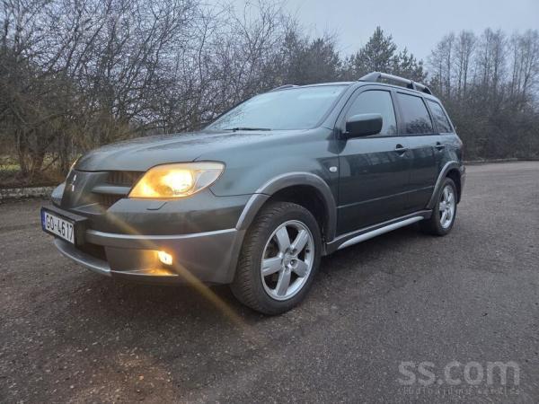 Zaļš Mitsubishi Outlander 2007 Daugavpils, ar dzinēja tilpumu 2.40 L un nobraukumu 0 tūkst. km par 2499 €, foto 6 vietnē AUTOMOTO.COM.LV