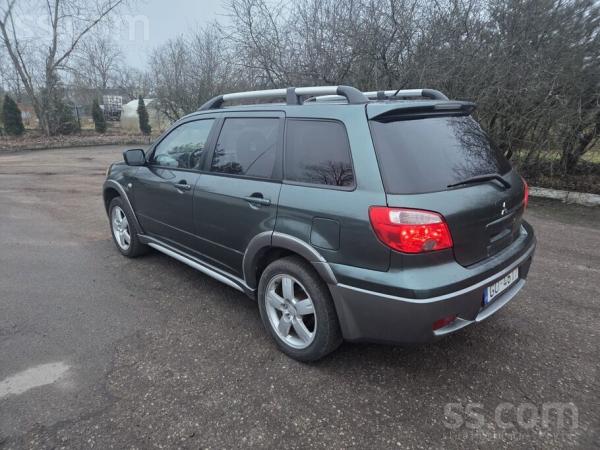 Zaļš Mitsubishi Outlander 2007 Daugavpils, ar dzinēja tilpumu 2.40 L un nobraukumu 0 tūkst. km par 2499 €, foto 9 vietnē AUTOMOTO.COM.LV