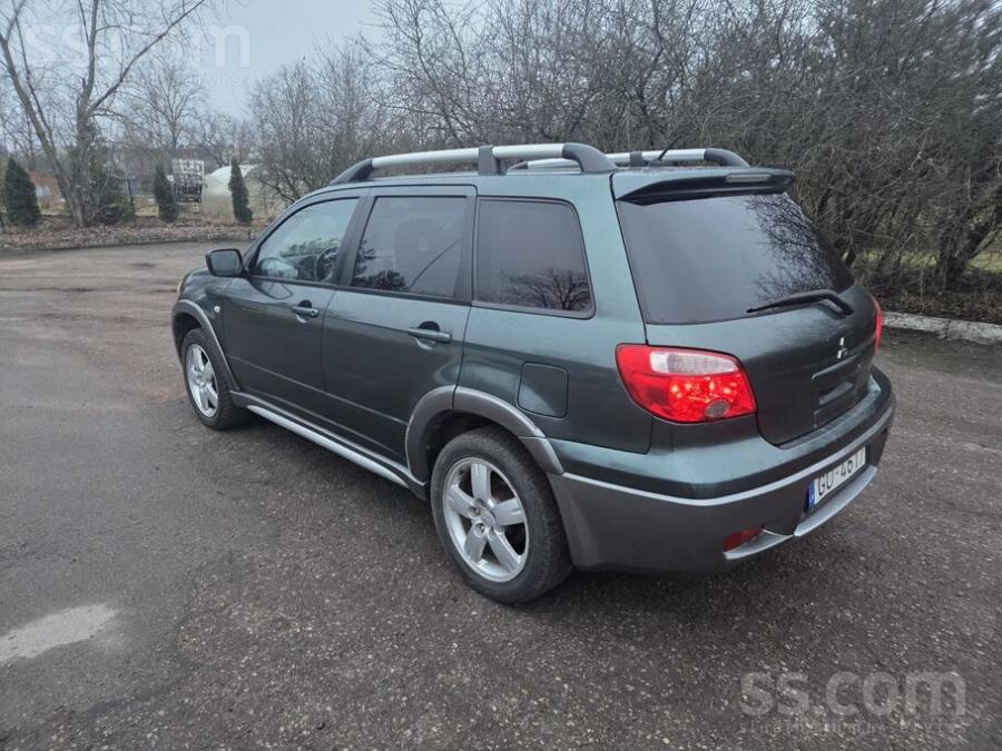 Zaļš Mitsubishi Outlander 2007 Daugavpils, ar dzinēja tilpumu 2.40 L un nobraukumu 0 tūkst. km par 2499 €, foto 9 vietnē AUTOMOTO.COM.LV