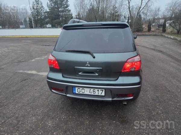 Zaļš Mitsubishi Outlander 2007 Daugavpils, ar dzinēja tilpumu 2.40 L un nobraukumu 0 tūkst. km par 2499 €, foto 10 vietnē AUTOMOTO.COM.LV