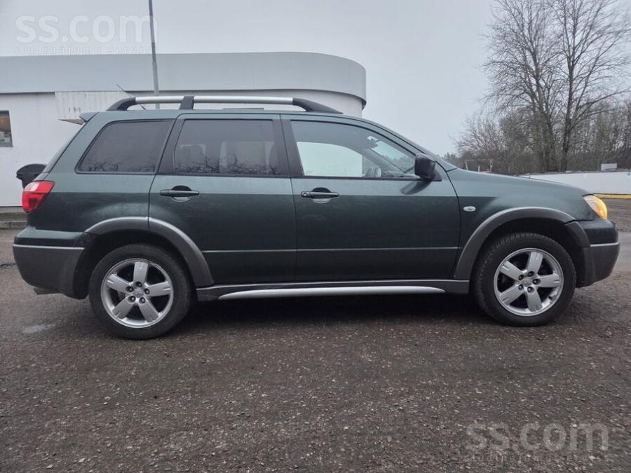 Zaļš Mitsubishi Outlander 2007 Daugavpils, ar dzinēja tilpumu 2.40 L un nobraukumu 0 tūkst. km par 2499 €, foto 11 vietnē AUTOMOTO.COM.LV