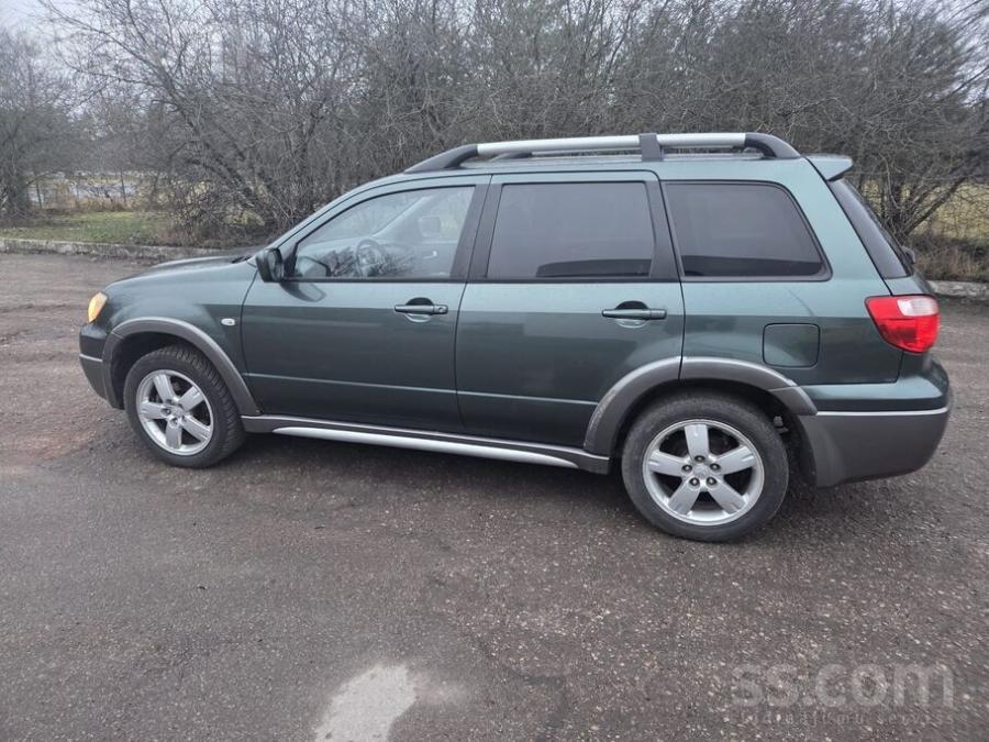 Zaļš Mitsubishi Outlander 2007 Daugavpils, ar dzinēja tilpumu 2.40 L un nobraukumu 0 tūkst. km par 2499 €, foto 12 vietnē AUTOMOTO.COM.LV
