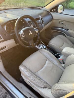 Zaļš Mitsubishi Outlander 2008 Rīga, ar dzinēja tilpumu 2.40 L un nobraukumu 160 tūkst. km par 2800 €, foto 6 vietnē AUTOMOTO.COM.LV