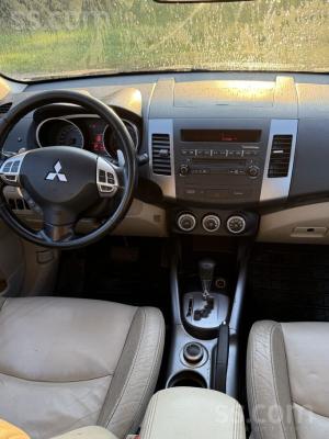 Zaļš Mitsubishi Outlander 2008 Rīga, ar dzinēja tilpumu 2.40 L un nobraukumu 160 tūkst. km par 2800 €, foto 8 vietnē AUTOMOTO.COM.LV