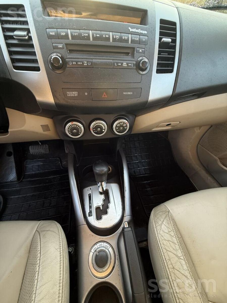 Zaļš Mitsubishi Outlander 2008 Rīga, ar dzinēja tilpumu 2.40 L un nobraukumu 160 tūkst. km par 2800 €, foto 9 vietnē AUTOMOTO.COM.LV