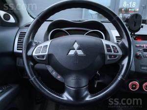 Zaļš Mitsubishi Outlander 2008 Cēsis, ar dzinēja tilpumu 2.00 L un nobraukumu 291 tūkst. km par 2499 €, foto 15 vietnē AUTOMOTO.COM.LV