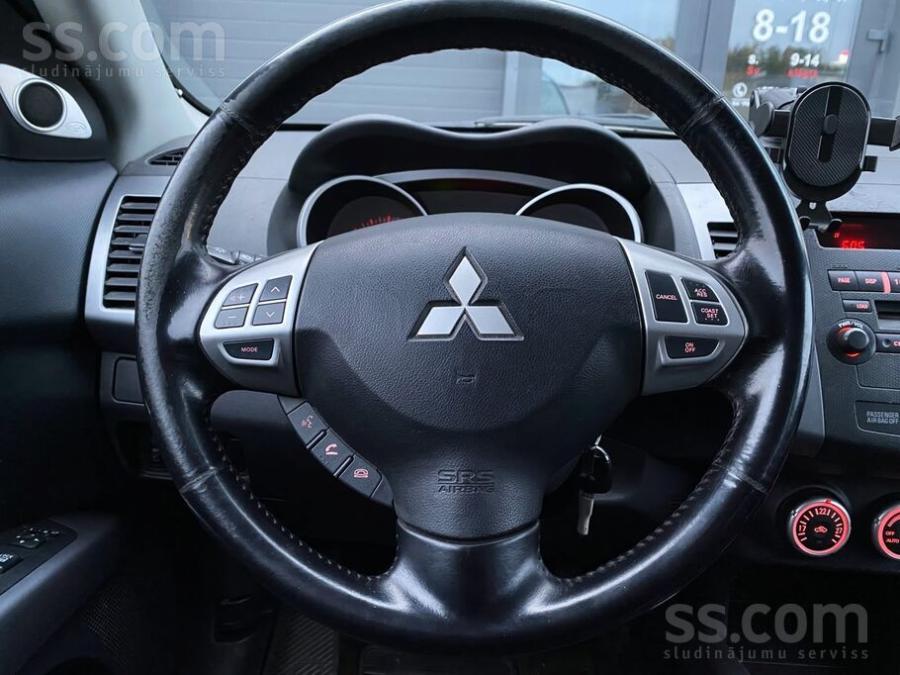 Zaļš Mitsubishi Outlander 2008 Cēsis, ar dzinēja tilpumu 2.00 L un nobraukumu 291 tūkst. km par 2499 €, foto 15 vietnē AUTOMOTO.COM.LV