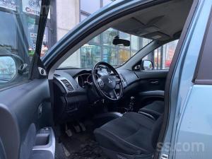 Zaļš Mitsubishi Outlander 2008 Cēsis, ar dzinēja tilpumu 2.00 L un nobraukumu 291 tūkst. km par 2499 €, foto 22 vietnē AUTOMOTO.COM.LV