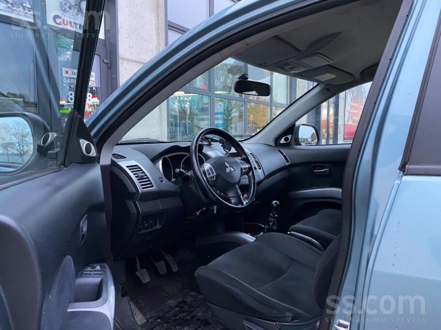 Zaļš Mitsubishi Outlander 2008 Cēsis, ar dzinēja tilpumu 2.00 L un nobraukumu 291 tūkst. km par 2499 €, foto 22 vietnē AUTOMOTO.COM.LV