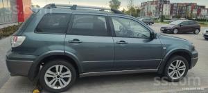 Pelēks Mitsubishi Outlander 2004 Rīga, ar dzinēja tilpumu 2.40 L un nobraukumu 169 tūkst. km par 2500 €, foto 4 vietnē AUTOMOTO.COM.LV