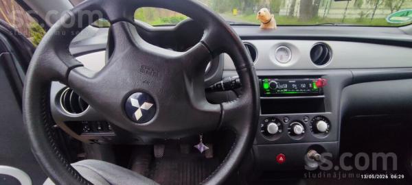 Grey Mitsubishi Outlander 2004 in Riga, with an engine capacity of 2.40 L and mileage of 169 thousand km for 2500 €, photo 5 on AUTOMOTO.COM.LV