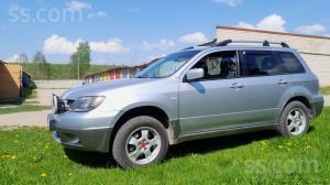 Pelēks Mitsubishi Outlander 2004 Rēzekne, ar dzinēja tilpumu 2.40 L un nobraukumu 296 tūkst. km par 2350 €, foto 3 vietnē AUTOMOTO.COM.LV