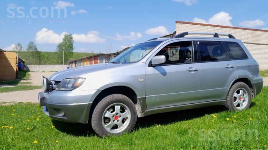 Pelēks Mitsubishi Outlander 2004 Rēzekne, ar dzinēja tilpumu 2.40 L un nobraukumu 296 tūkst. km par 2350 €, foto 3 vietnē AUTOMOTO.COM.LV